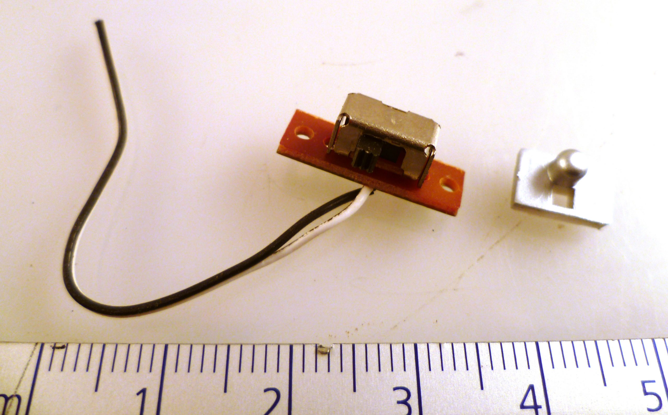 Miniature PCB Mounted Slide Switch SPST 9x4x4mm Leaded B/W OM1025C ...